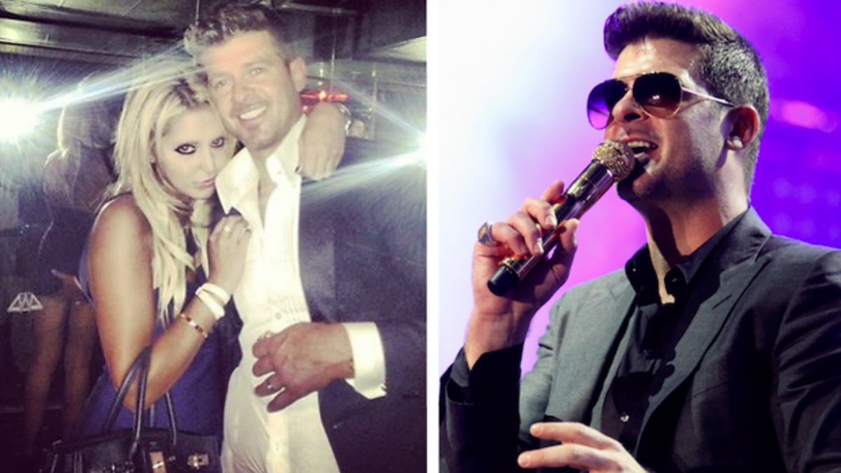Hon fotades med Robin Thicke: "Hans hand var på min rumpa"